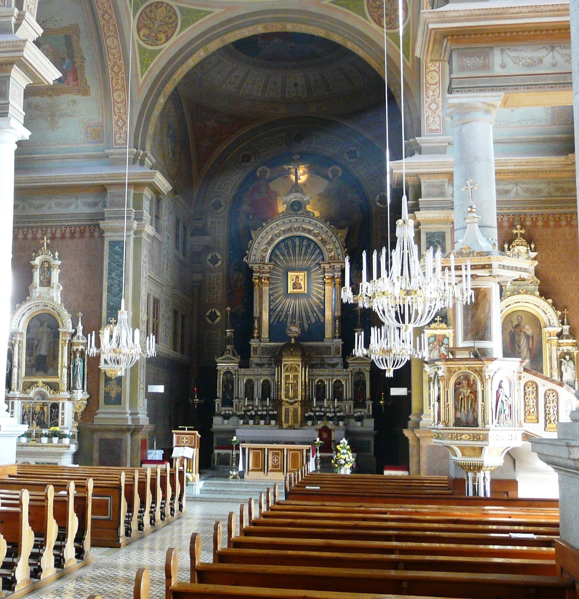 Church interiors as Altars, Ambos, Reredos in wood, marble and bronze.